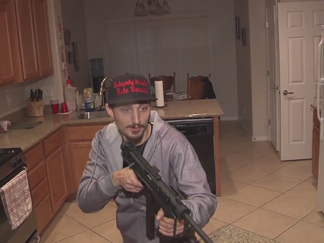 Man comes face-to-face with armed intruder