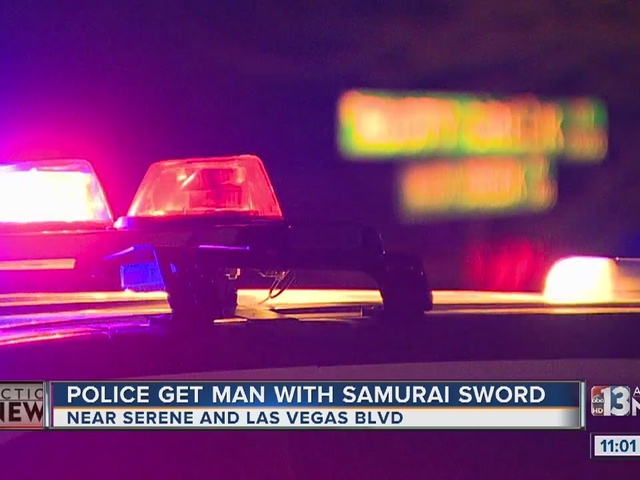 Standoff ends, sword-wielding man in custody