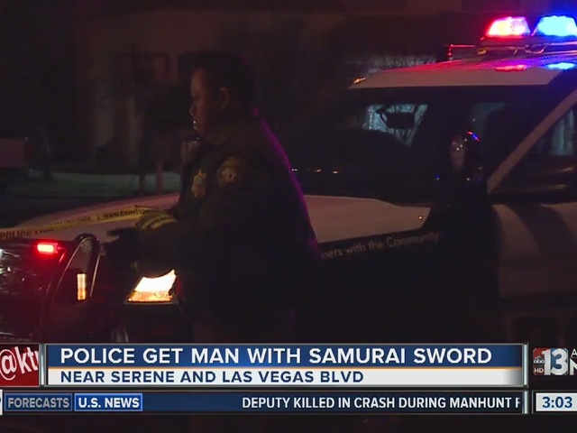 Standoff ends, sword-wielding man in custody